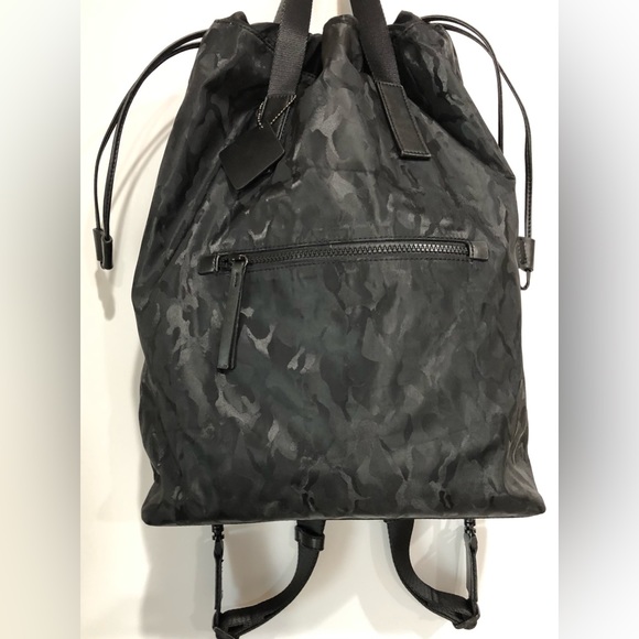 ZYIA | Bags | Zyia Black Camo Convertible Backpack Cinch Bag Zipper ...